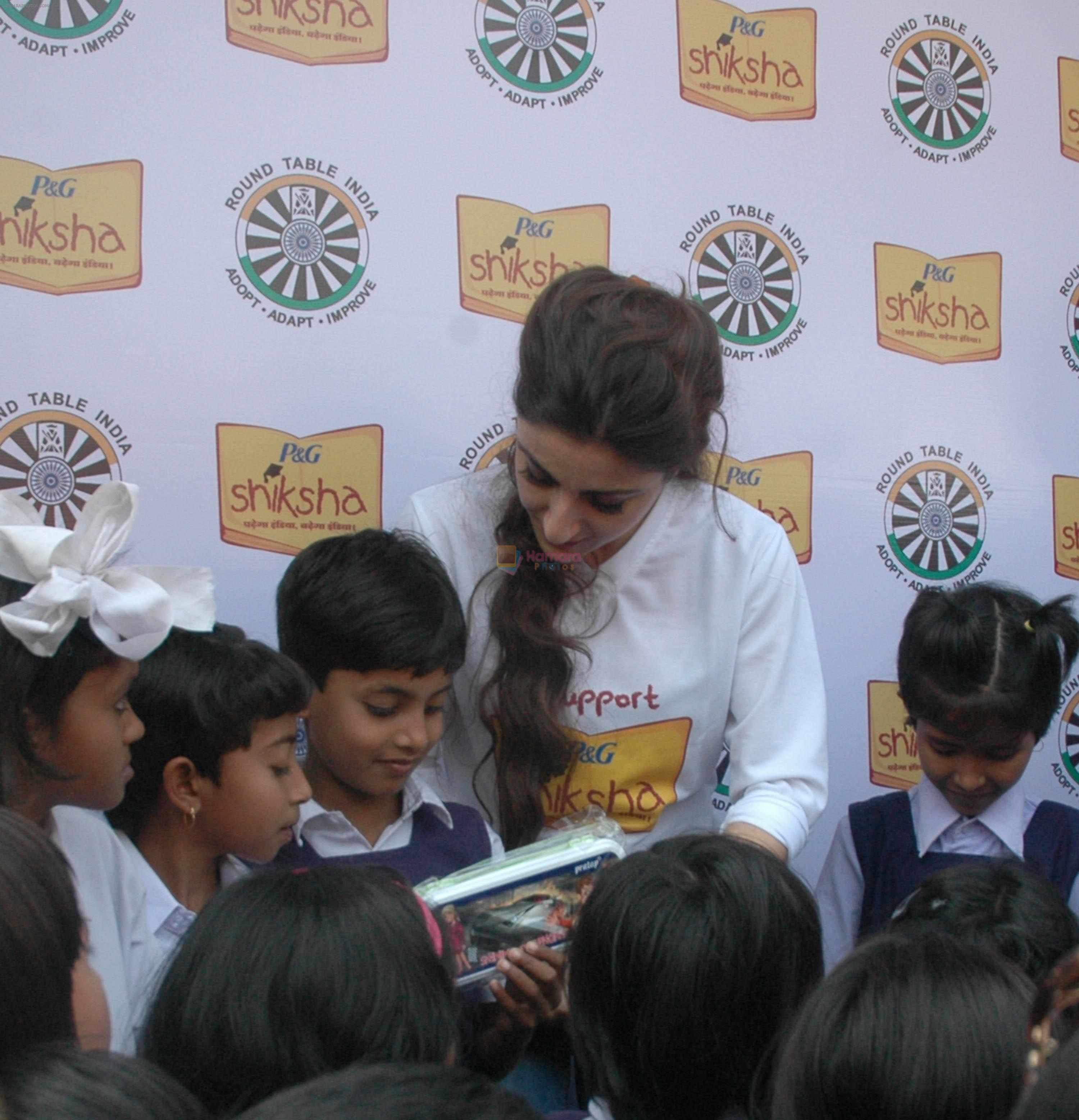 Soha Ali Khan in a charity for a School at Deganga West Bengal on 14th March 2014 / Soha Ali ...